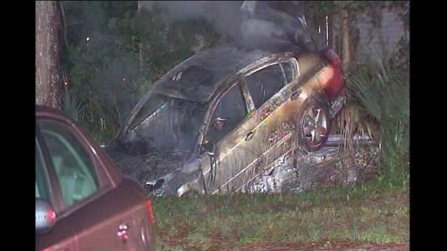 Body in burned car identified