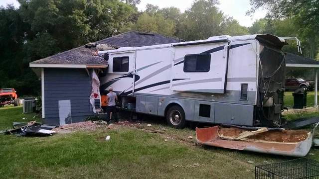 RV crashes into home in Lake City